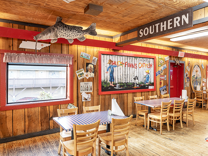Wood-paneled walls adorned with fishing memorabilia create the perfect backdrop for comfort food that speaks to your soul.