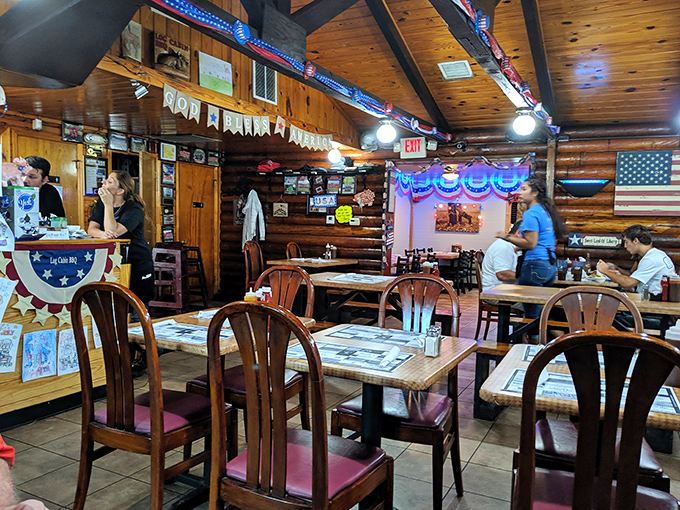 Step inside and time slows down. Wooden walls, patriotic decor, and the promise of smoky delights create the perfect backdrop for barbecue bliss.