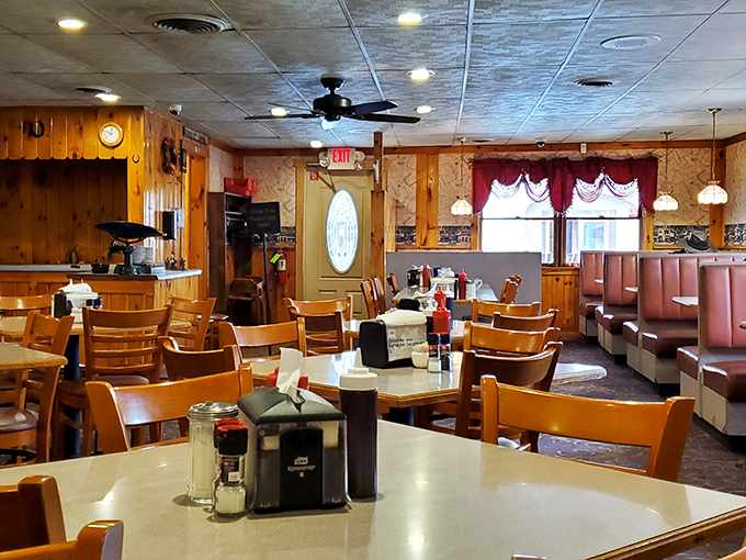 Wood paneling, pink booths, and ceiling fans spinning stories overhead&mdash;this isn't retro by design, it's authentic by default.