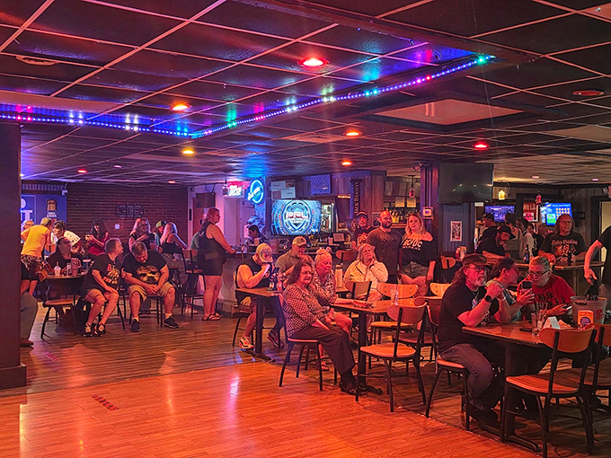 Mid-century modern meets contemporary cool in this dining room where every table feels like the best seat in the house. The warm lighting practically whispers, "Stay for dessert."