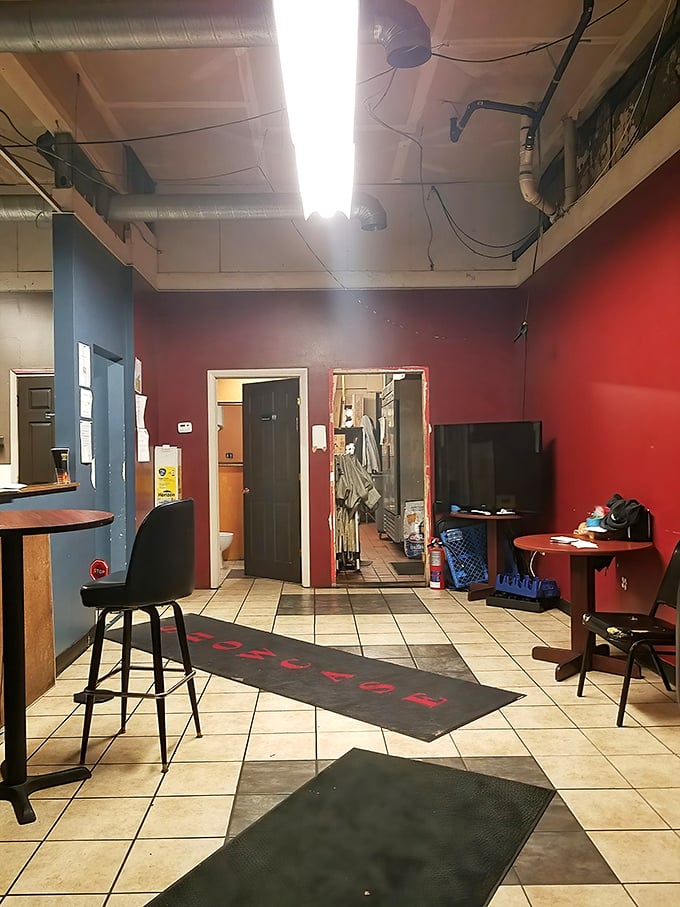 Inside, nautical meets neighborhood bar with weathered wood, hanging glass floats, and corrugated metal that whispers tales of storms weathered and grouper grilled to perfection.