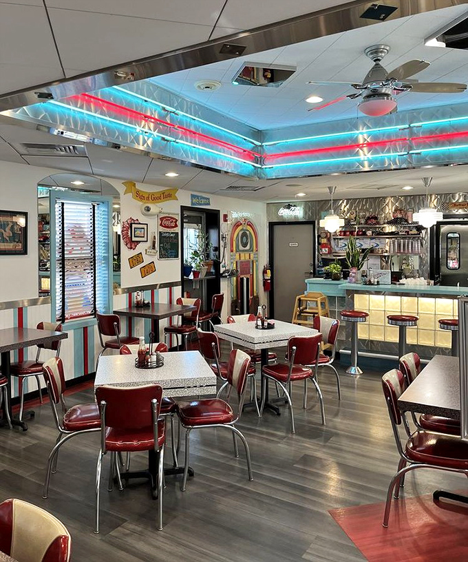 Step inside and the neon-lit ceiling instantly transports you to happier days when rock 'n' roll was young and milkshakes were a food group.