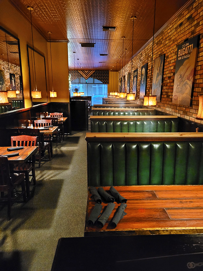Brick walls, leather booths, and that magnificent tin ceiling create the perfect backdrop for food memories. Like stepping into a Scorsese film, minus the mobsters.