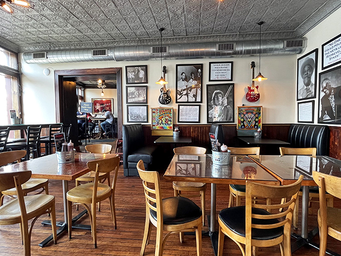 Blues legends watch over diners from every wall, as if to say, "Take your time, savor every bite." The tin ceiling echoes with approval.