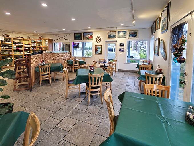 Simple wooden tables, green tablecloths, and nautical d&eacute;cor create that perfect "I've discovered something authentic" atmosphere that makes seafood taste even better.