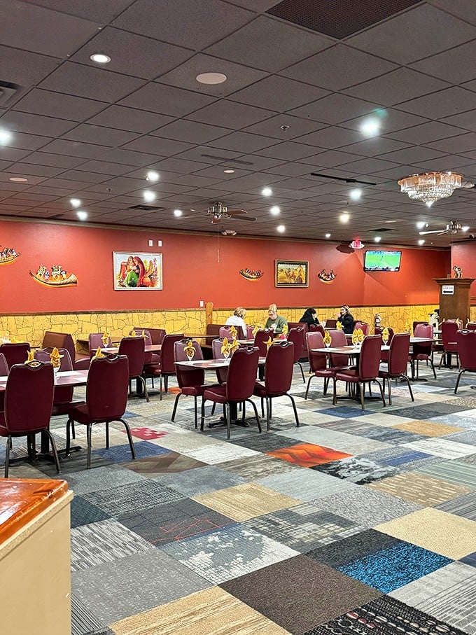 Inside, warm terracotta walls and burgundy chairs create an atmosphere that's both exotic and comforting—like a hug from a spice merchant.