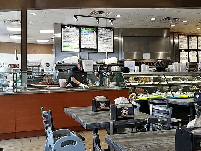 Bright, airy, and inviting—the café's garage-door windows create an indoor-outdoor experience that says, "Stay awhile, the cheese isn't going anywhere."