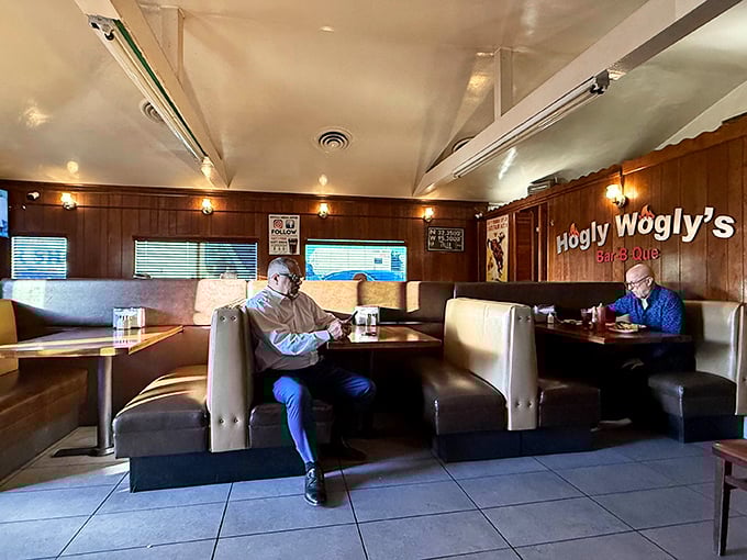 Wood-paneled walls and cozy booths create the perfect backdrop for the meat-centric magic about to unfold on your plate.