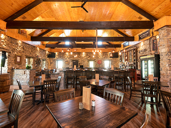 Wooden beams meet fieldstone walls in this rustic-luxe dining room where centuries of conversations have marinated alongside perfectly aged steaks.