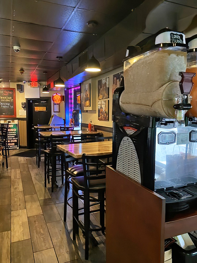 Inside, the cozy dining area balances neighborhood charm with serious food intentions. That slushie machine isn't just for show, folks.