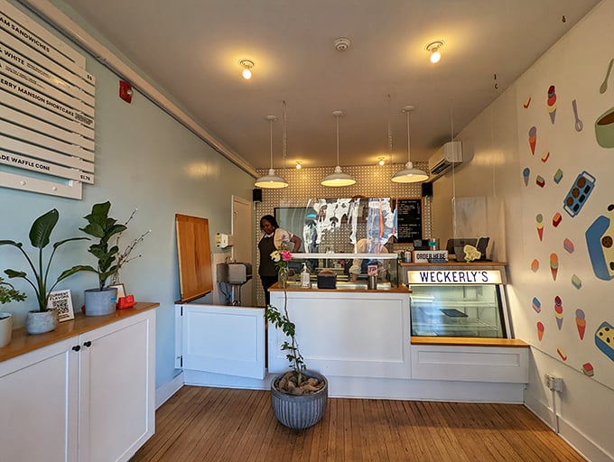 Minimalist charm meets sweet functionality in this bright, airy space where ice cream dreams come true one scoop at a time.