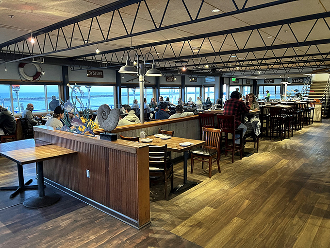 Inside, warm wood tones and panoramic ocean views create the perfect backdrop for seafood feasting and maritime daydreaming.