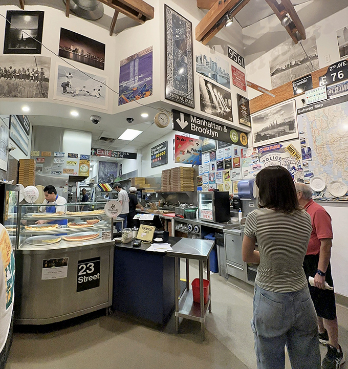 New York nostalgia covers every inch of wall space. It's like someone bottled the essence of Manhattan and released it 3,000 miles west.