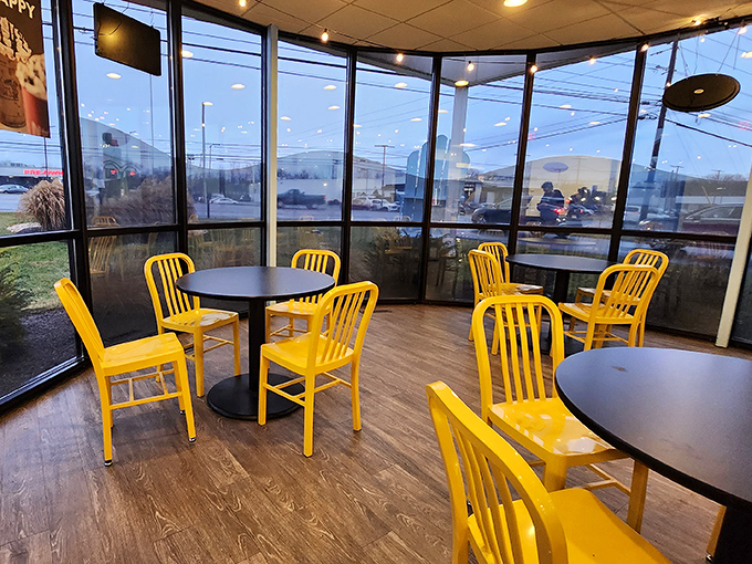 Sunshine yellow chairs invite you to linger over your sweet creations. The floor-to-ceiling windows let you people-watch while you donut-indulge.