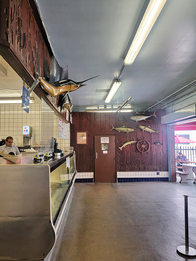 Mounted fish watch over diners from wood-paneled walls &ndash; silent witnesses to decades of seafood satisfaction. The nautical decor isn't ironic; it's authentic.