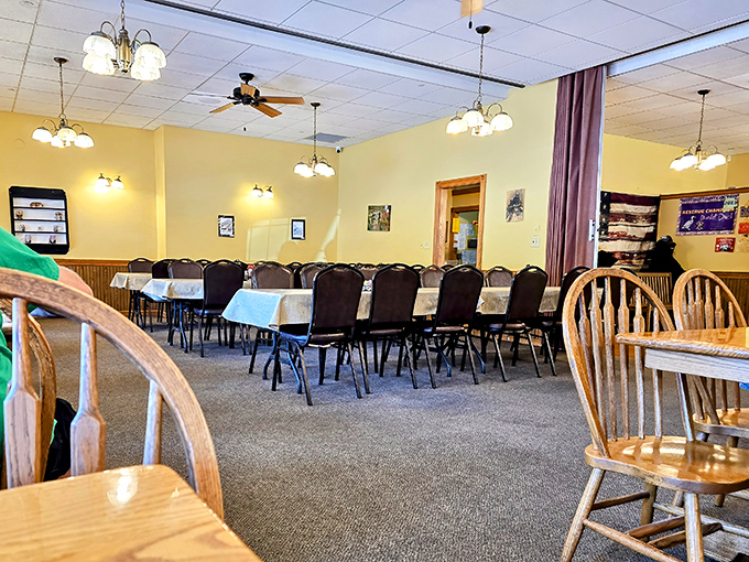 Those golden walls and vintage fixtures create the dining room equivalent of a warm hug from grandma.