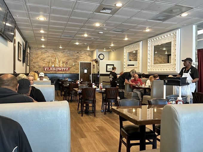 Inside, the warm brick walls and comfortable booths create that perfect "everybody knows your order" atmosphere where comfort food meets comfort zone. 