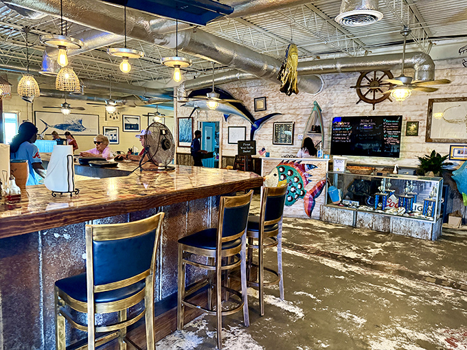 Inside, nautical meets nostalgia with fishing nets, ship wheels, and mounted fish keeping watchful eyes on your dining experience.