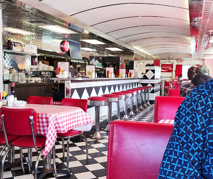 Step inside and you're transported to a bygone era &ndash; red vinyl booths, checkerboard floors, and chrome accents create the quintessential American diner experience that no corporate chain could replicate.
