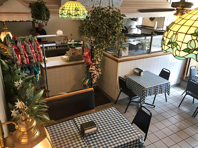 Step inside and time stands still &ndash; checkered tablecloths, Tiffany lamps, and potted plants create the quintessential family pizzeria atmosphere that no designer could replicate.