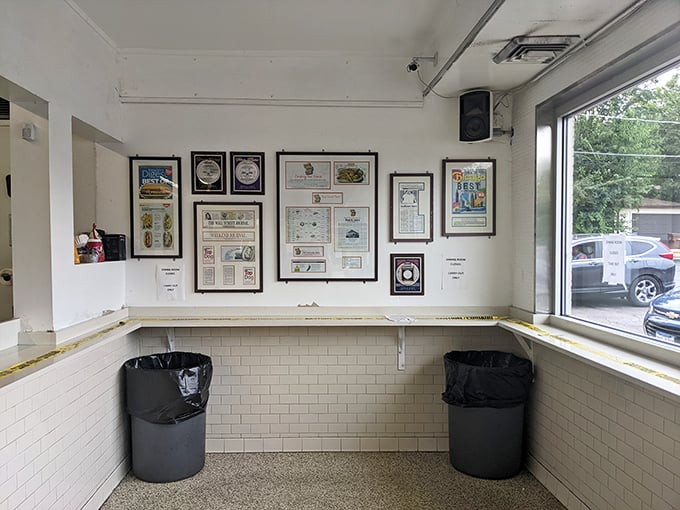 Inside, vibrant red walls and hanging plants create that perfect balance between "trendy breakfast spot" and "place where you can actually hear your conversation."