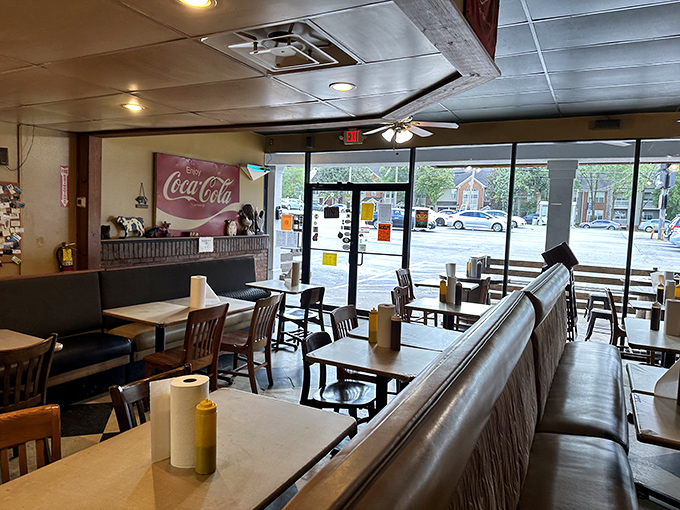 Simple wooden tables, bench seating, and a vintage Coca-Cola sign &ndash; this no-frills interior puts the focus squarely where it belongs: on the food.