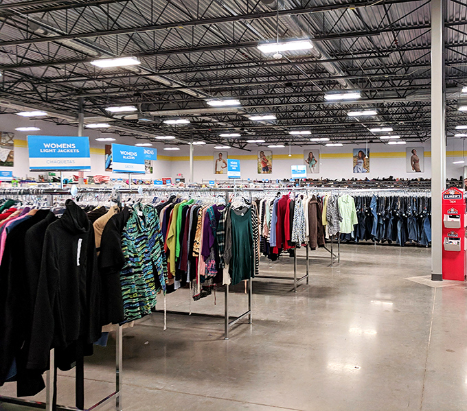 Endless aisles stretch like a secondhand symphony, each rack promising discoveries waiting to happen.