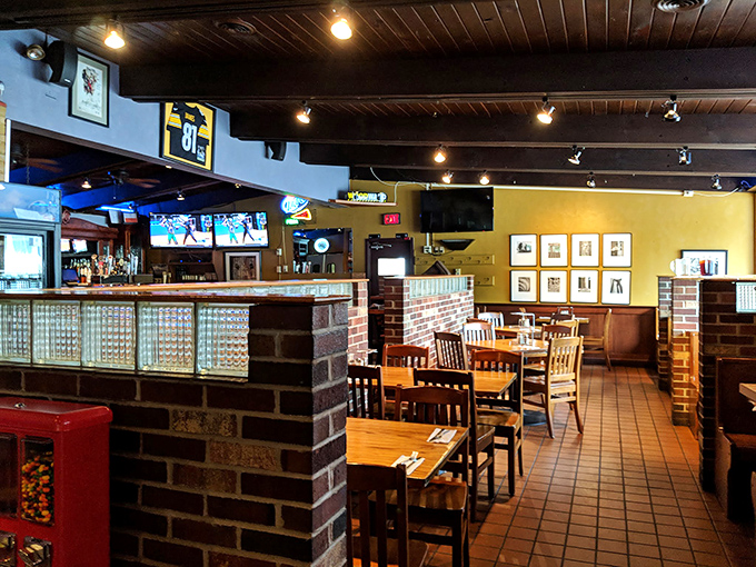 Yellow walls and exposed brick create the kind of warmth that makes you want to settle in and stay awhile.