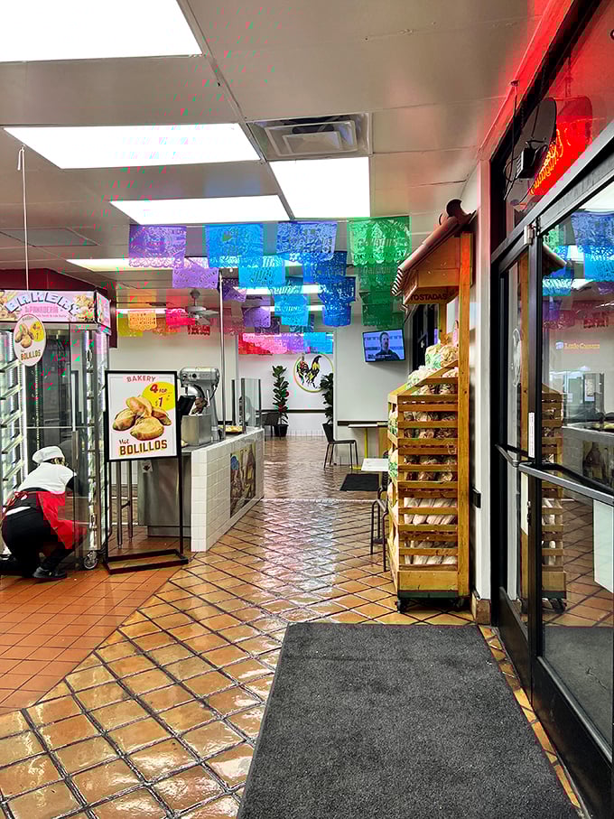 Step inside and the fiesta begins. Colorful papel picado banners dance overhead while the aroma of fresh-baked bread and sizzling meats performs a sensory salsa.