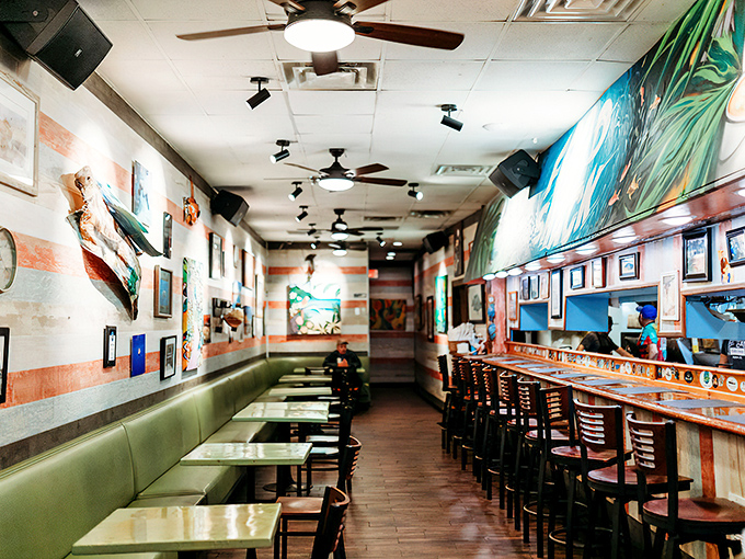 Step inside where vibrant murals and comfortable seating create the perfect backdrop for serious seafood indulgence.