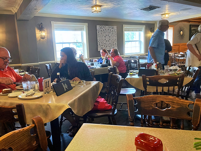 Step inside where warm lighting and comfortable seating create the perfect supper club atmosphere.