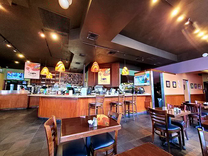 Inside, warm wood tones and pendant lighting create that perfect "neighborhood favorite" vibe &ndash; comfortable enough for regulars, welcoming enough for first-timers.