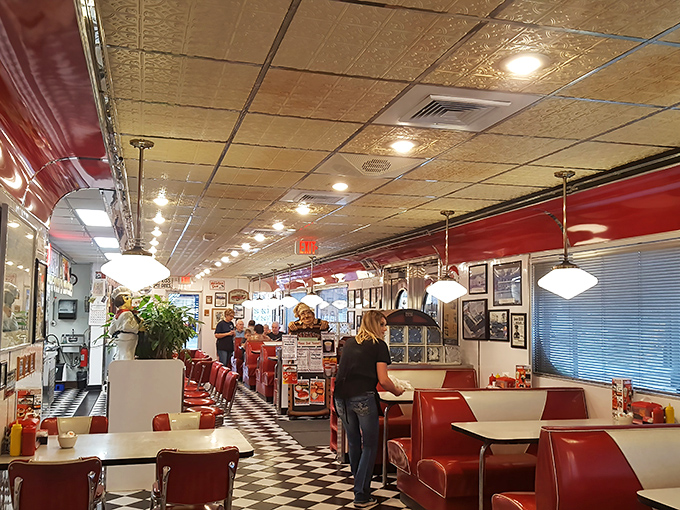 Red vinyl booths, checkered floors, and that unmistakable diner buzz—stepping inside Maddy's is like walking into a time machine that serves breakfast all day.