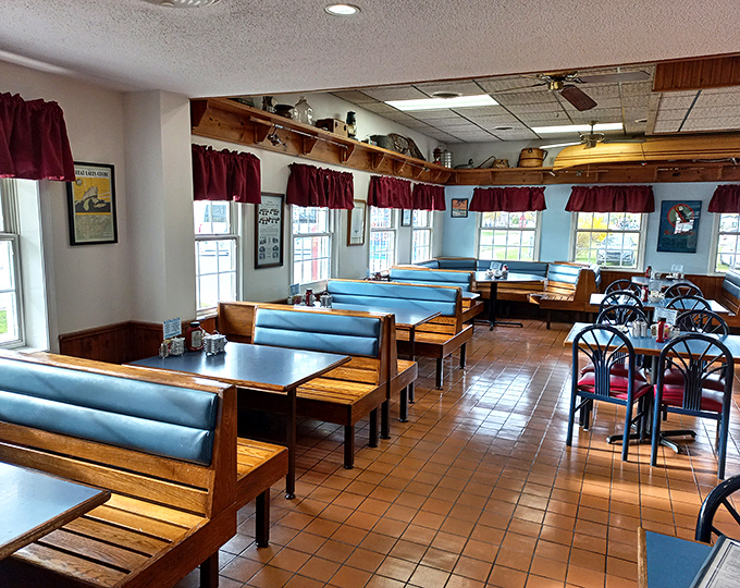 Blue booths and burgundy curtains create that perfect "come as you are" atmosphere where comfort food and comfort seating go hand in hand.