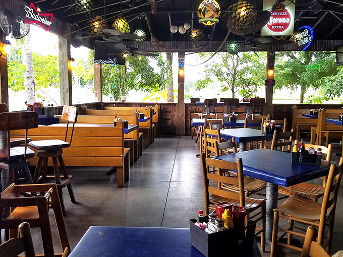 Wooden booths, open-air vibes, and the promise of seafood that'll make you question why you ever eat anything else.