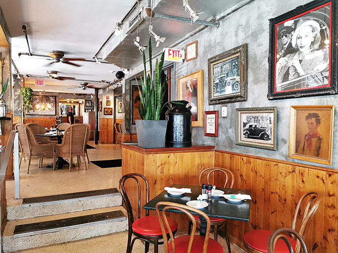 Vintage photographs and warm wood paneling create that perfect "been here forever" vibe. History lives on these walls while ceiling fans keep the Florida heat at bay.