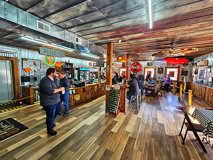 Step inside and the aroma hits you like a welcome hug. Wood paneling, vintage signs, and that unmistakable barbecue perfume &ndash; you're home now.