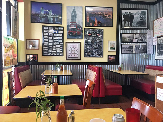 London calling from California! The walls showcase British icons while corrugated metal and red vinyl booths create a cozy, unpretentious atmosphere.