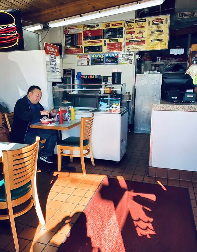 Inside Mike's, time slows down as diners savor each bite in a space where conversations flow as freely as the milkshakes.