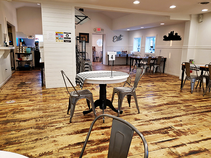 Rustic wooden floors and metal chairs create that perfect "come as you are" vibe where the food, not the decor, rightfully takes center stage.