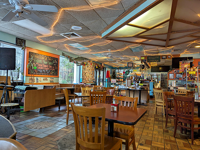 String lights zigzag across the ceiling like a maritime constellation, creating the perfect backdrop for seafood feasts and Eastern Shore storytelling.
