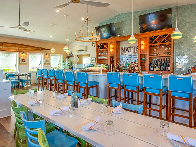 Blue chairs that match the ocean outside, warm wood tones, and a bar that beckons&mdash;this is where seafood dreams come true.