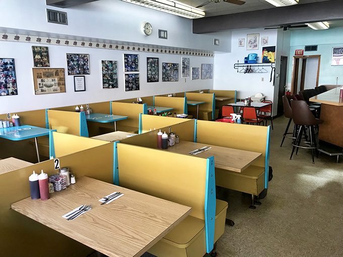 Golden booths and numbered tables create the perfect stage for morning miracles and coffee conversations.