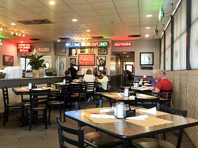 Inside, the classic diner aesthetic welcomes you with neon signs, comfortable seating, and the promise of meals that defy modern portion control.