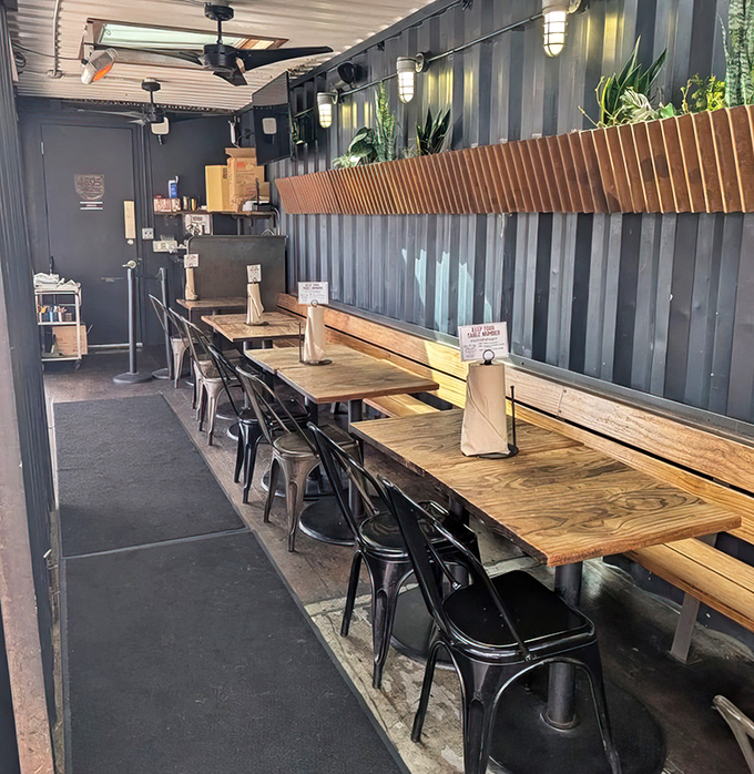 Industrial-chic meets meat-lover's paradise in this no-nonsense interior where the focus is squarely on what matters: exceptional barbecue.