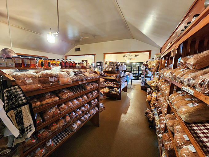 Bread paradise exists, and it looks exactly like this. Wooden shelves lined with fresh-baked loaves that make grocery store bread seem like a sad, distant relative.