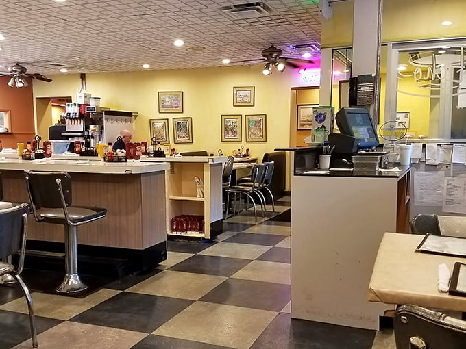 Classic diner aesthetics meet homey comfort inside The Echo, where the checkered floor and counter seating have witnessed countless morning revelations over steaming coffee cups.