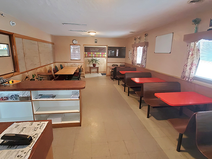 Those pink walls and black booths? Pure diner poetry that whispers "comfort food lives here."