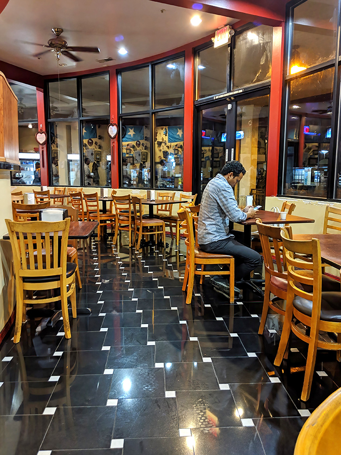 The warm wooden chairs and checkerboard floor create an unpretentious backdrop where the real stars&mdash;those magnificent Somali flavors&mdash;can truly shine.