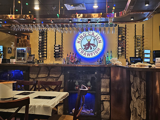 Behind that glowing neon crawfish sign lies seafood nirvana. The bar area's warm lighting sets the perfect mood for the messy deliciousness that awaits.